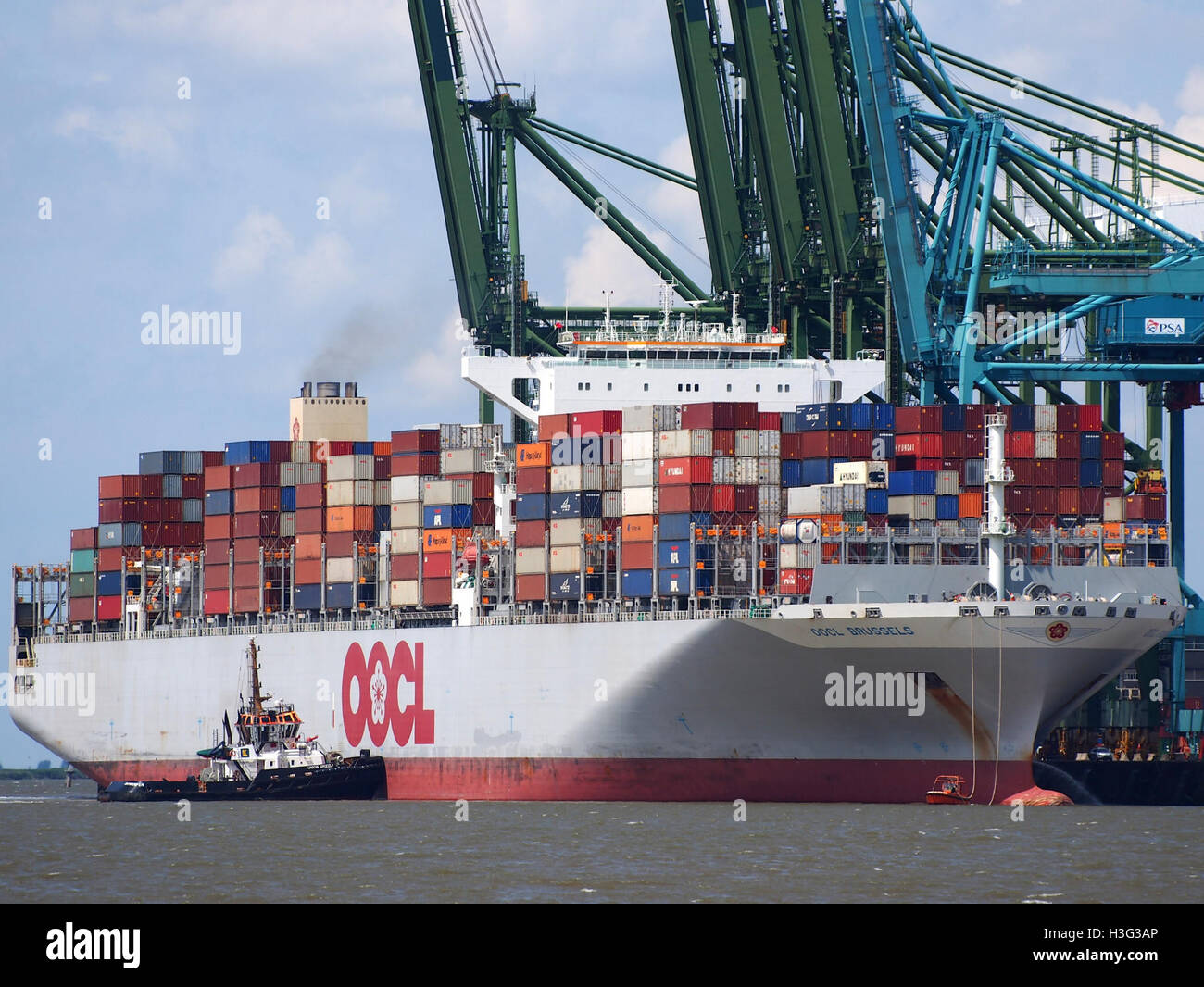 The OOCL Brussels is a modern container ship seen here in the Port of ...
