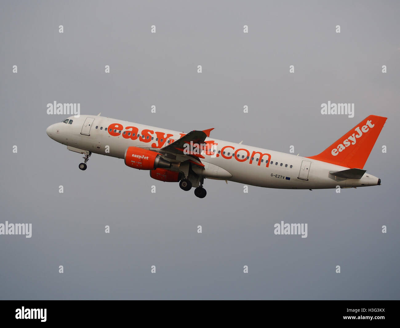 G-EZTV, an easyJet Airbus A320-214, taking off from Schiphol Airport ...