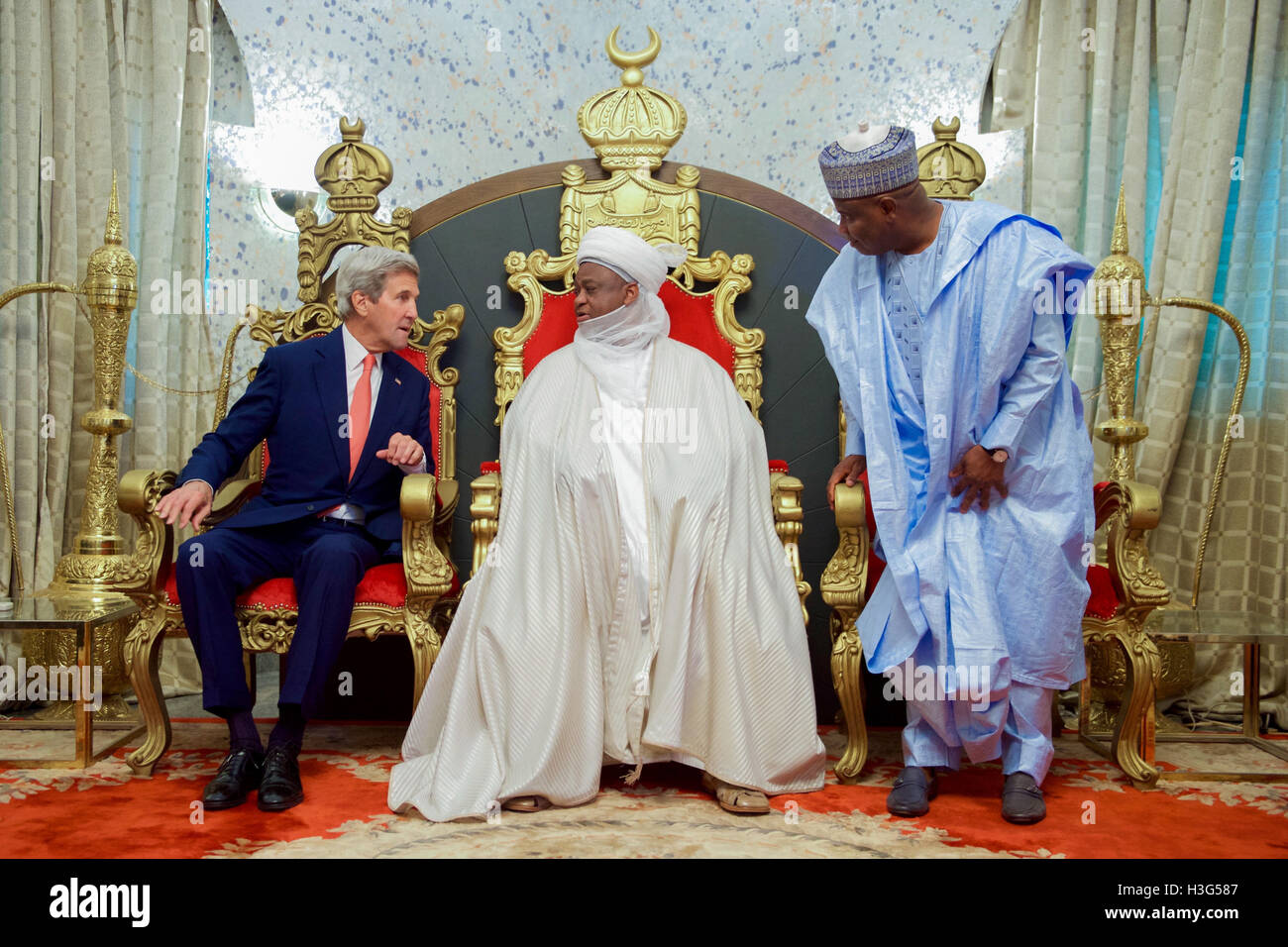 U.S. Secretary of State John Kerry sits with Sultan Muhammadu Sa’ad Abubakar, and Governor of ...