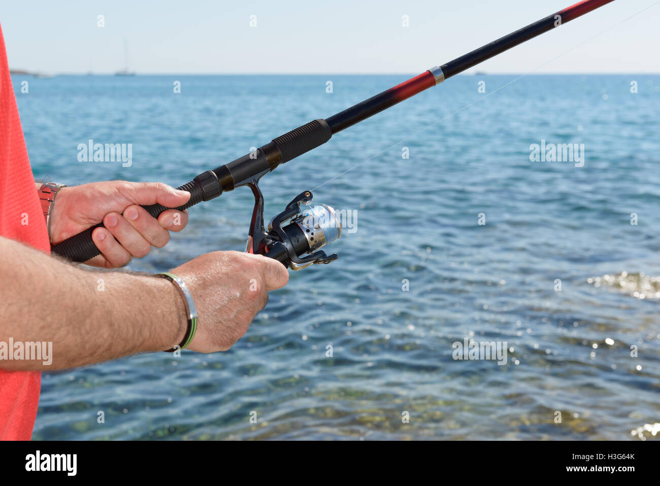 A fisherman with the fishing rod hi-res stock photography and images ...