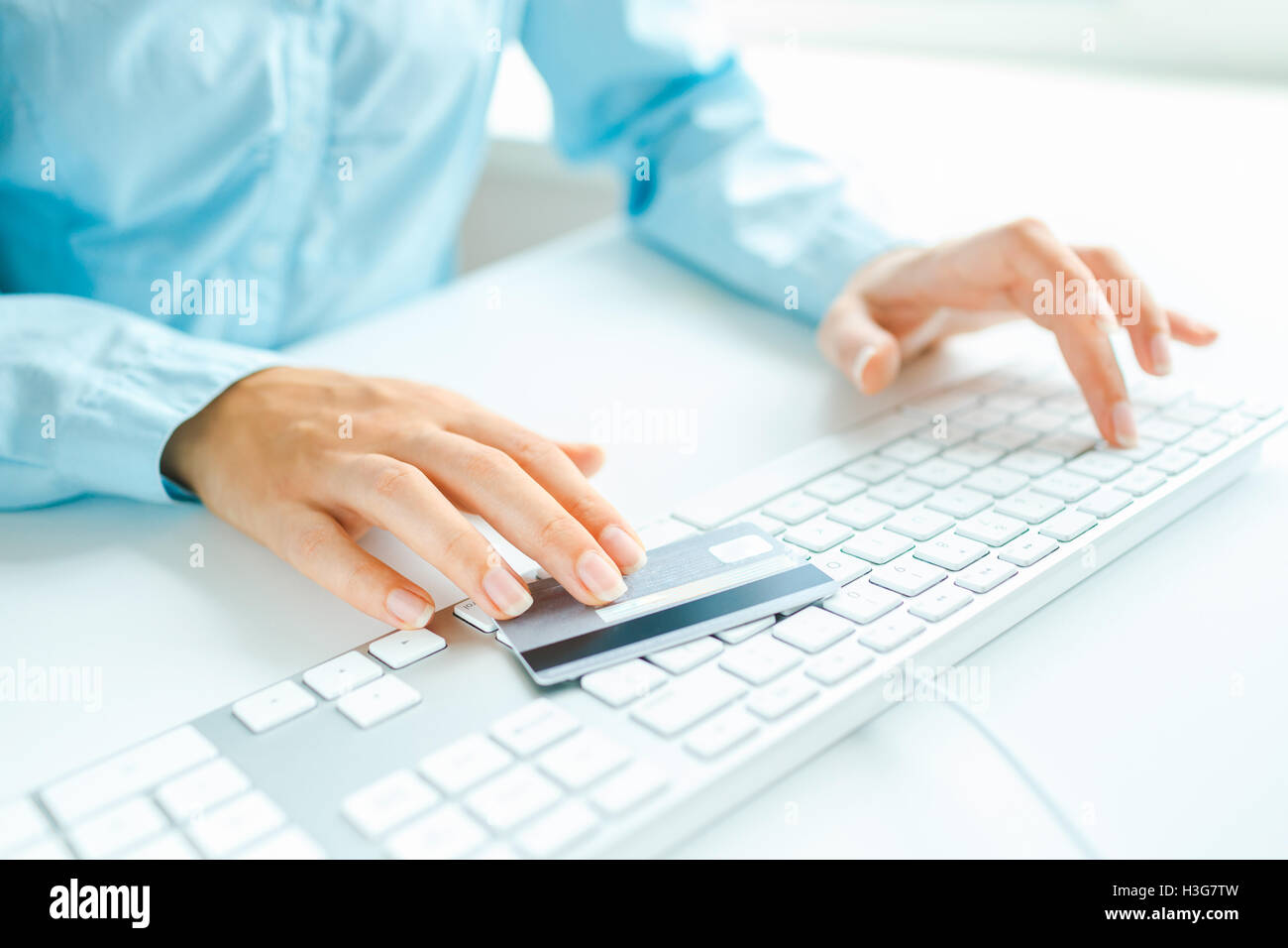 Hands using computer and credit card on it. Online shopping Stock Photo ...