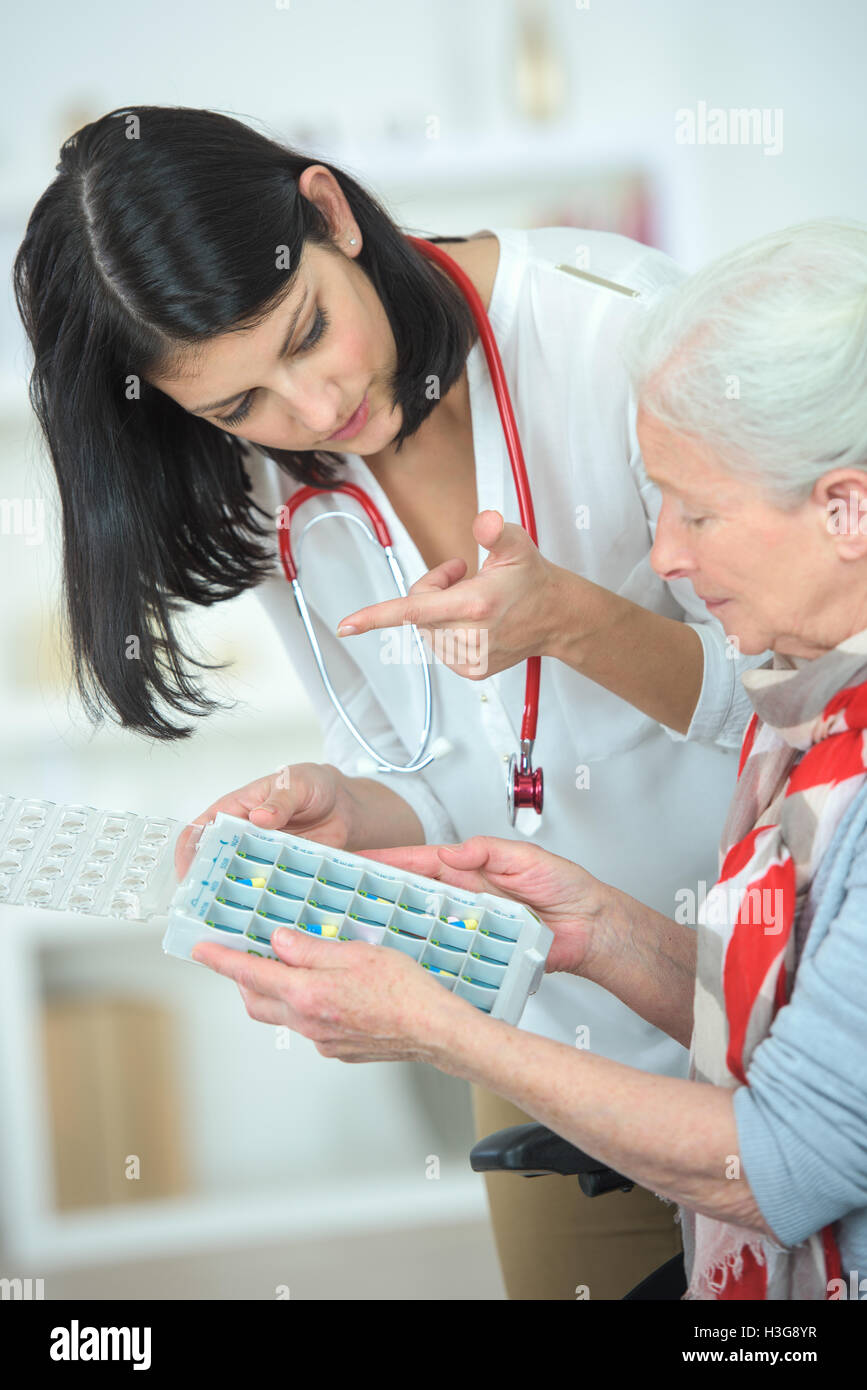 Helping an old woman hi-res stock photography and images - Alamy