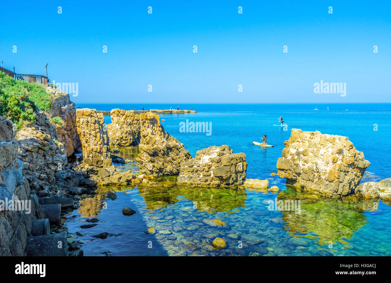 The picturesque coastline with the ruins of the ancient Roman city in ...
