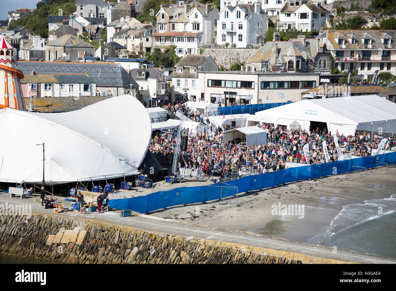 25 September 2016 Looe music festival, Cornwall. Crowds on the beach ...