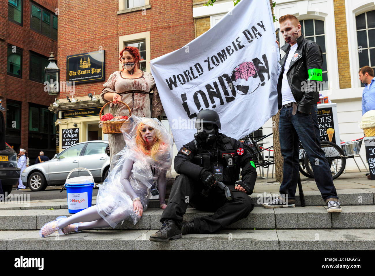 London, UK. 8th Oct 2016. Hundreds of people dressed as Zombies roam ...