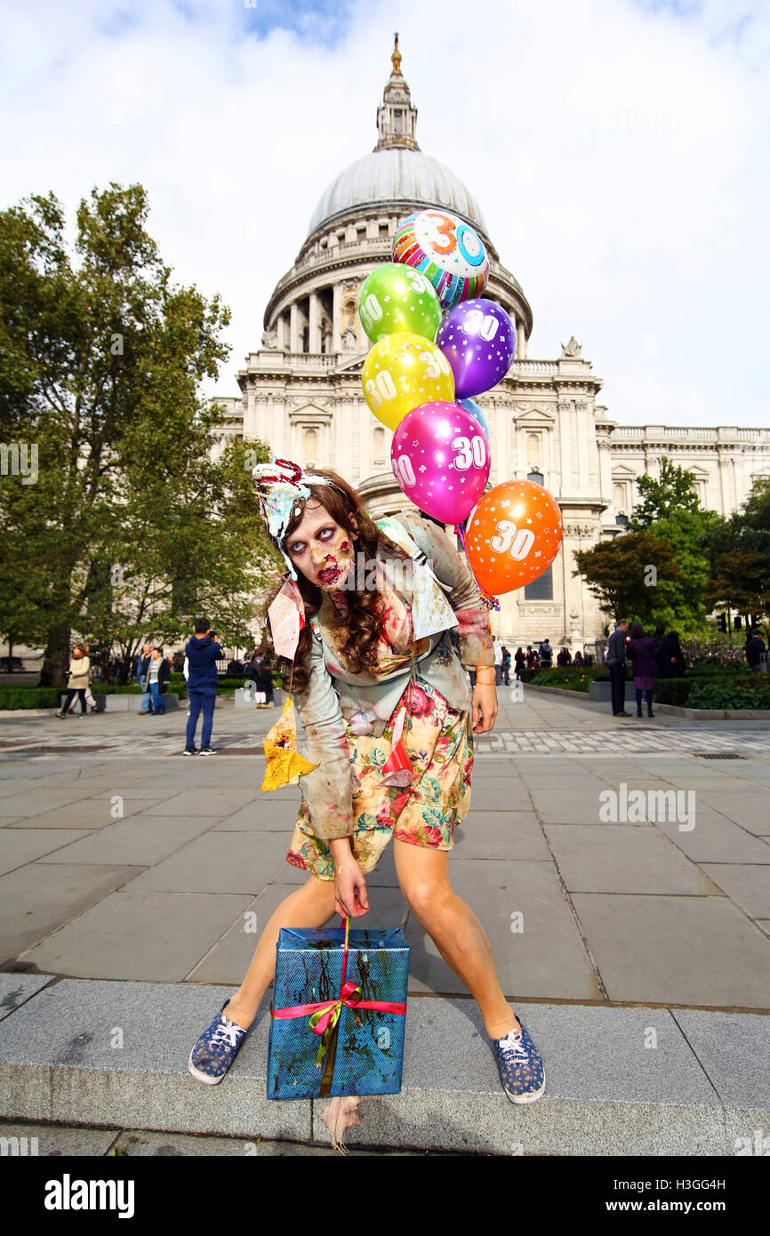 London, UK. 8th Oct, 2016. Participants dressed as undead zombies for ...