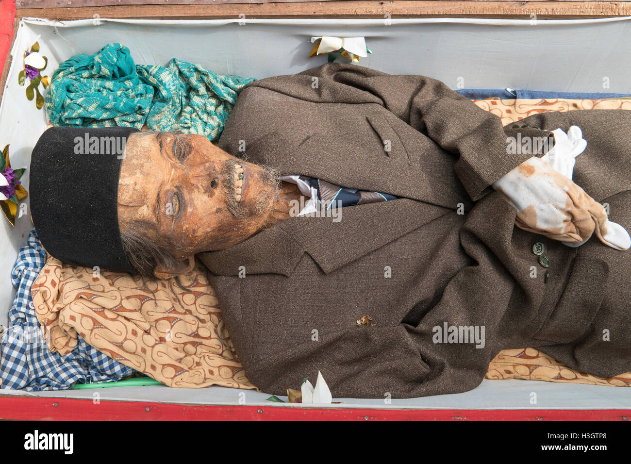 The dead body to bring up dead by the relatives to clean off their ...