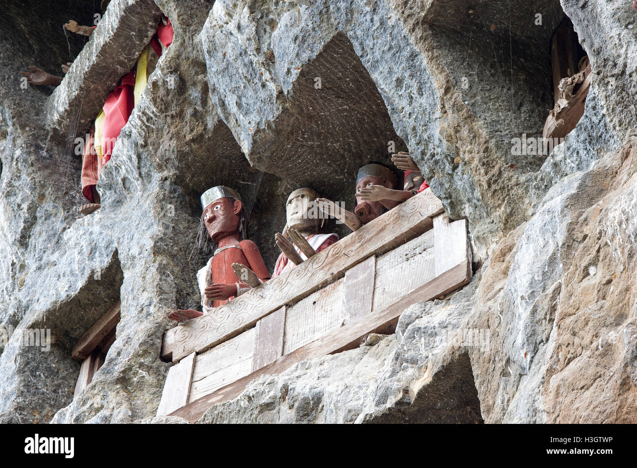 The burial site with coffins placed in caves carved into the rock Stock ...