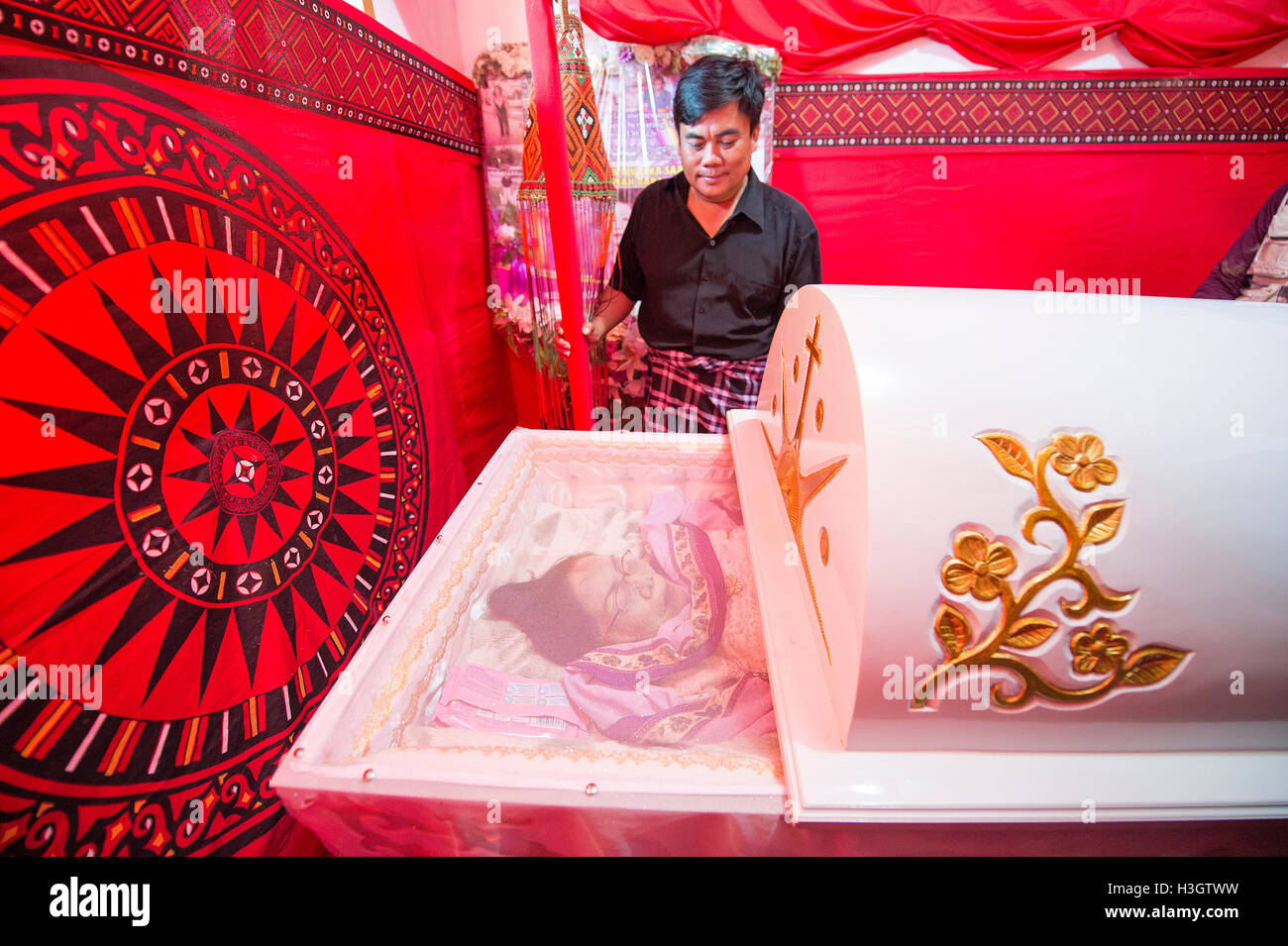 The 10 month dead body inside the coffin visited by her relatives for a ...