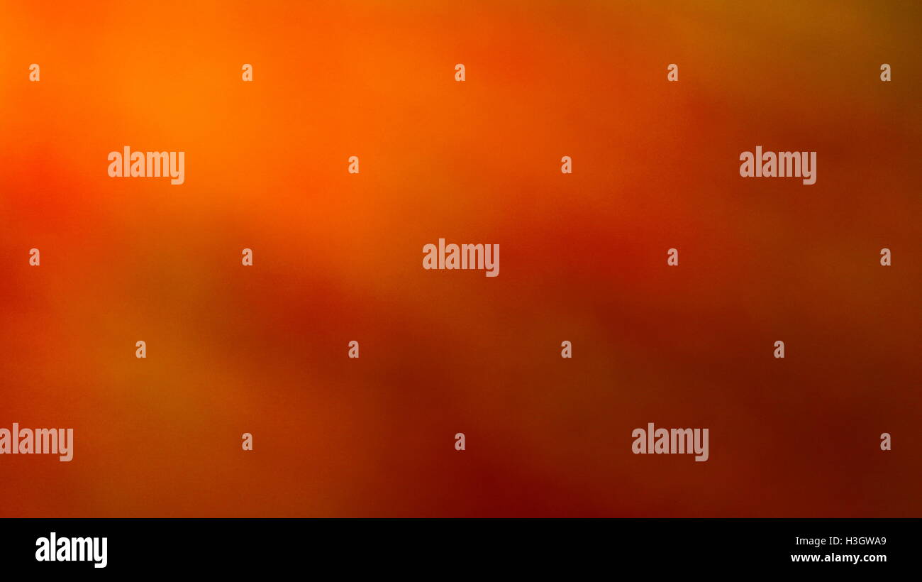 Warm pastel coloured orange abstract merging background Stock Photo - Alamy