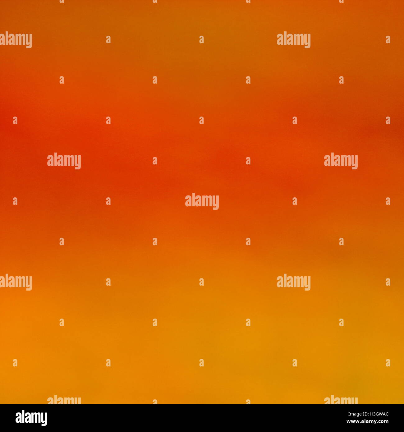 Warm pastel coloured orange abstract merging background Stock Photo - Alamy
