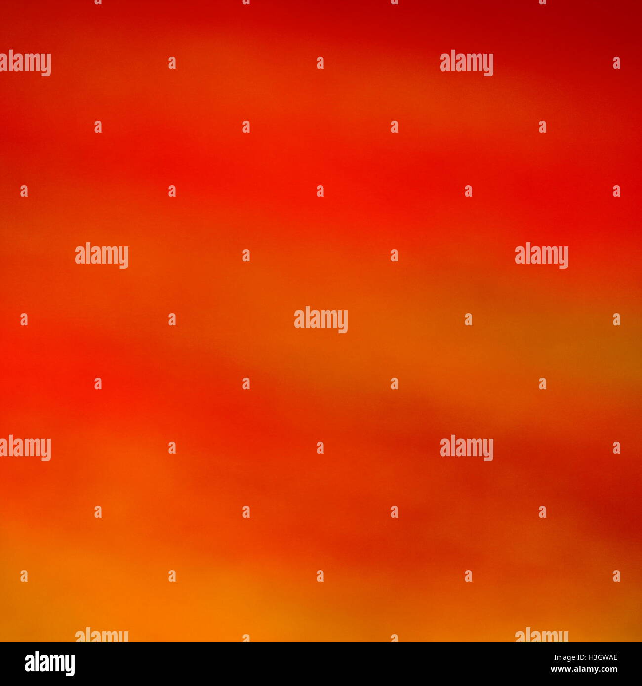Warm orange and red pastel coloured abstract merging background Stock ...