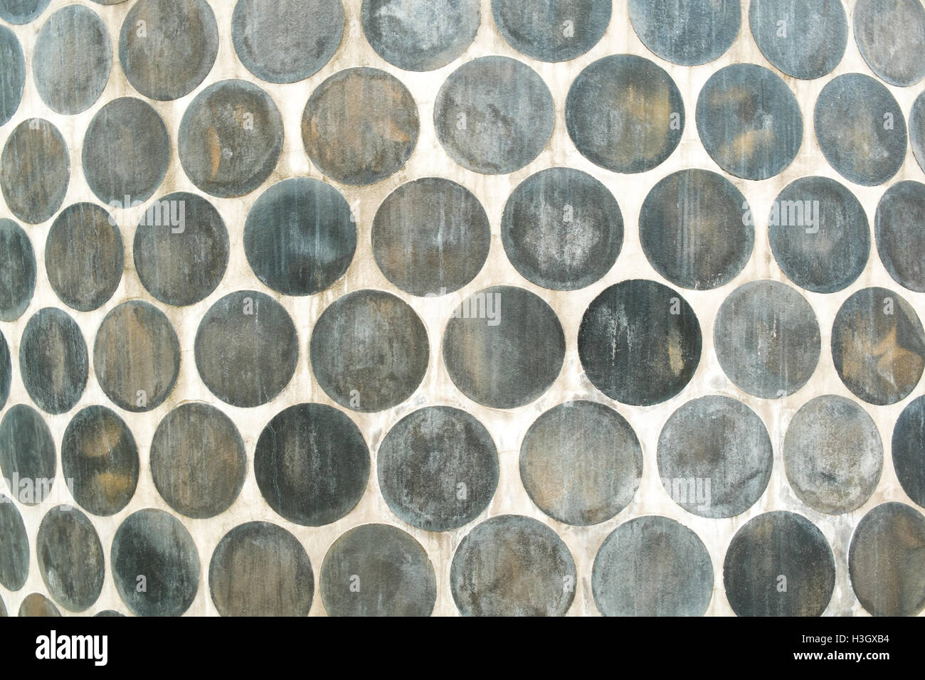 Full frame take of a pattern of circular clay tiles Stock Photo - Alamy