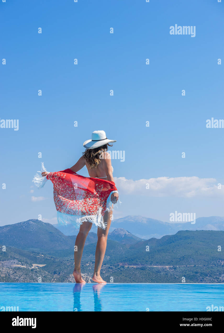 Woman sun swimming costume hi-res stock photography and images - Alamy