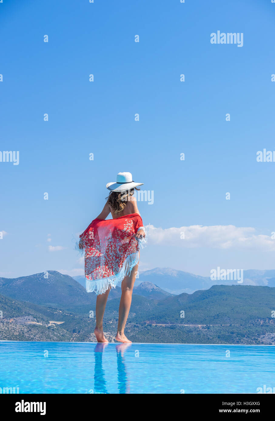 Woman sun swimming costume hi-res stock photography and images - Alamy