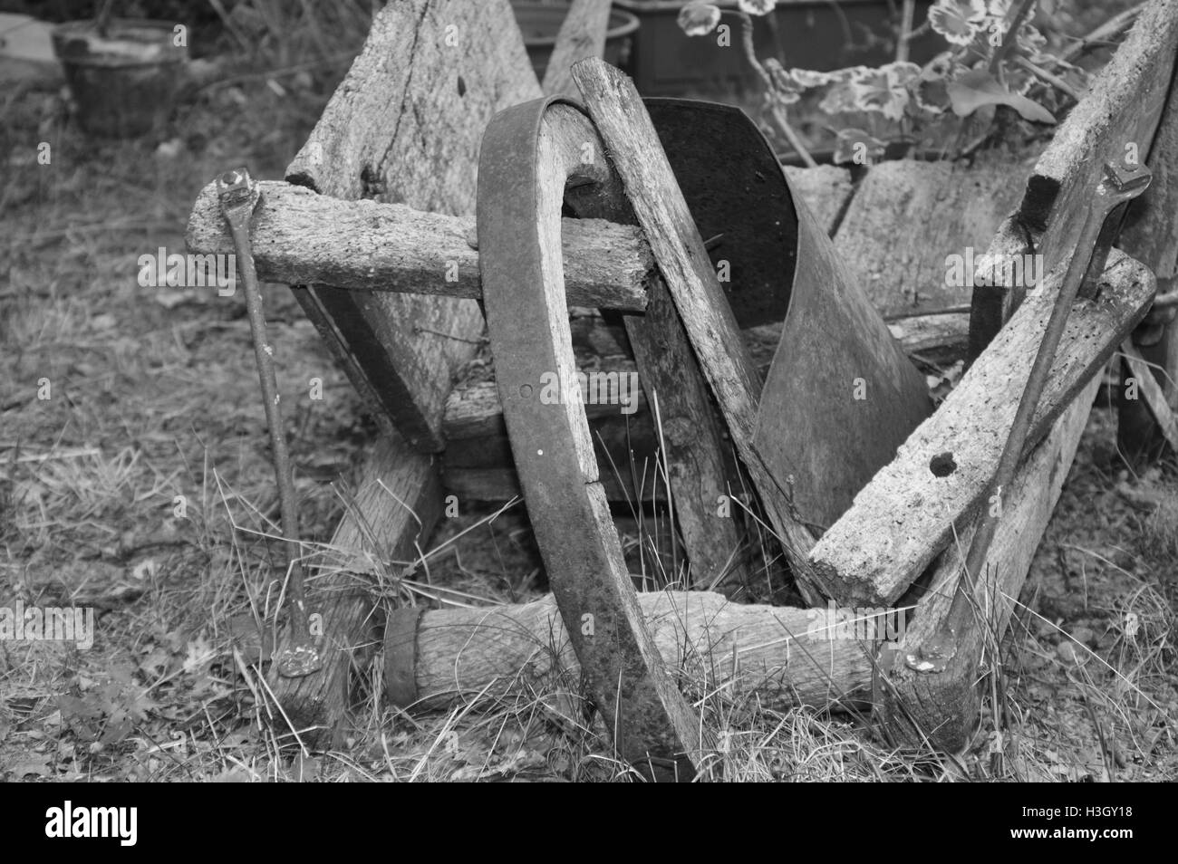 Broken wheelbarrow hi-res stock photography and images - Alamy