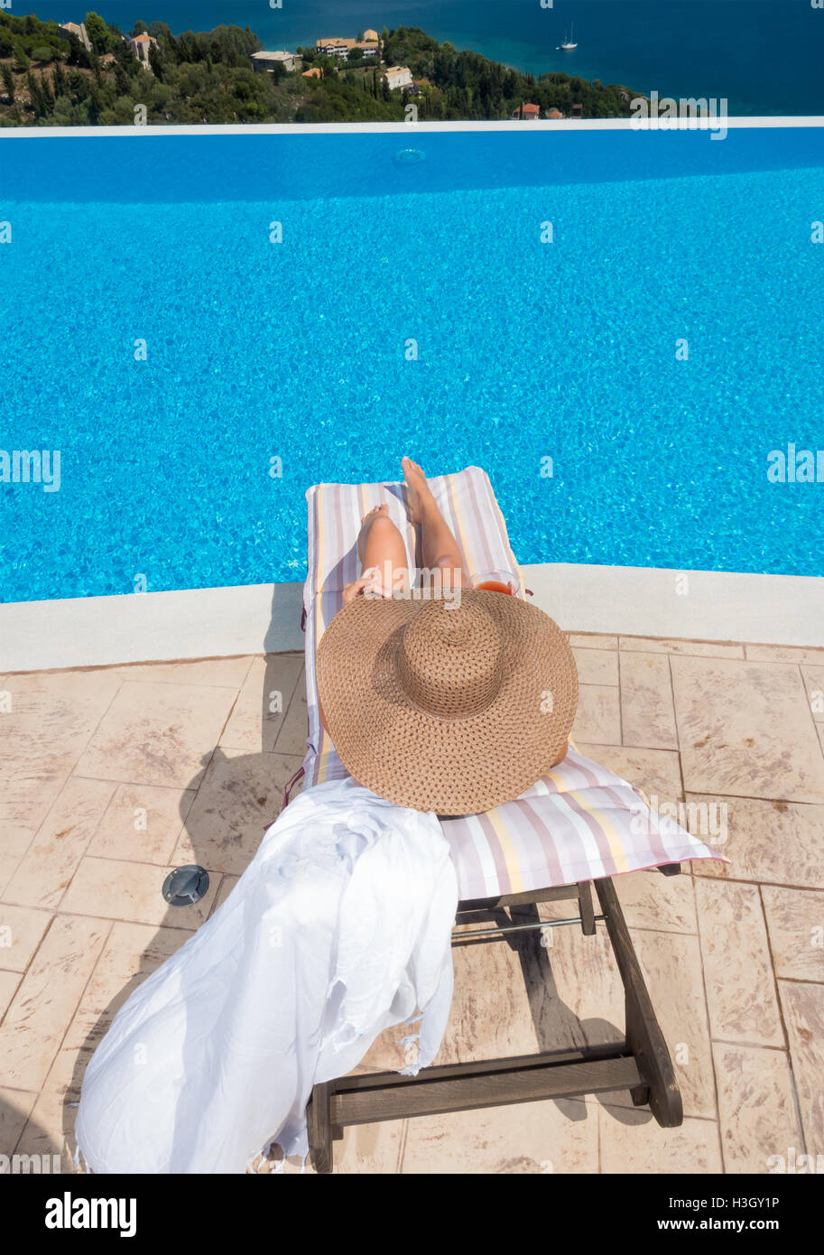 Back view woman pool hi-res stock photography and images - Alamy