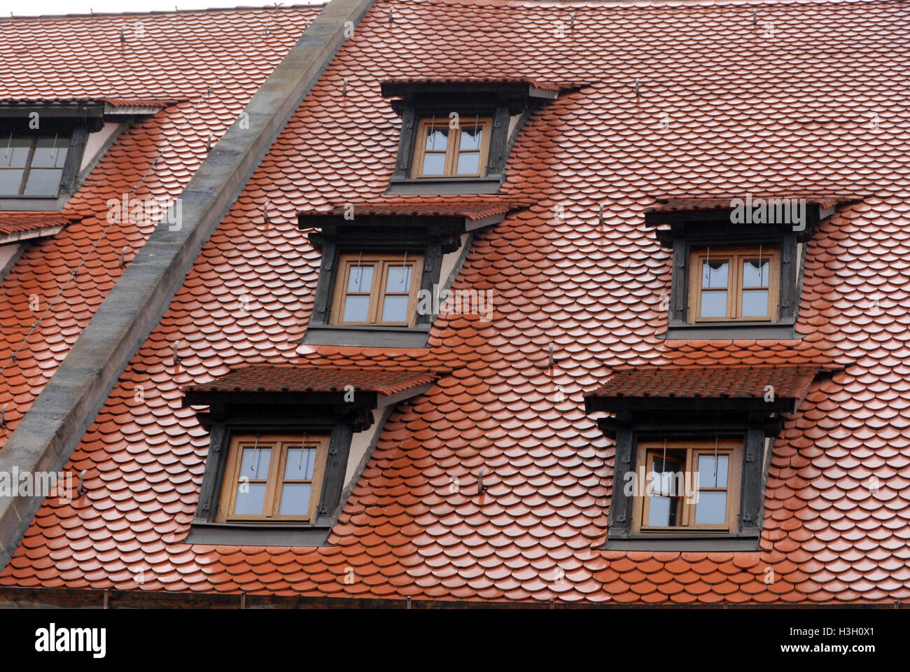 Older Bavarian-style buildings with steeped roofs and windows in ...