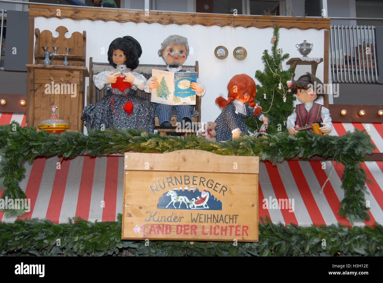 A model room of a family of puppets in a Christams scene displayed on ...