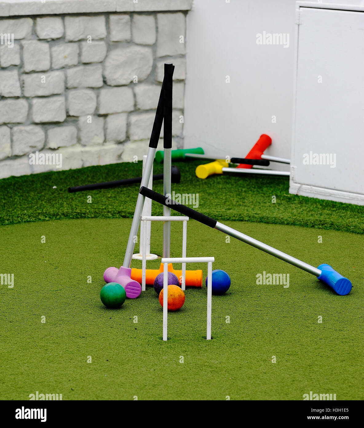Croquet mallets and balls Stock Photo - Alamy