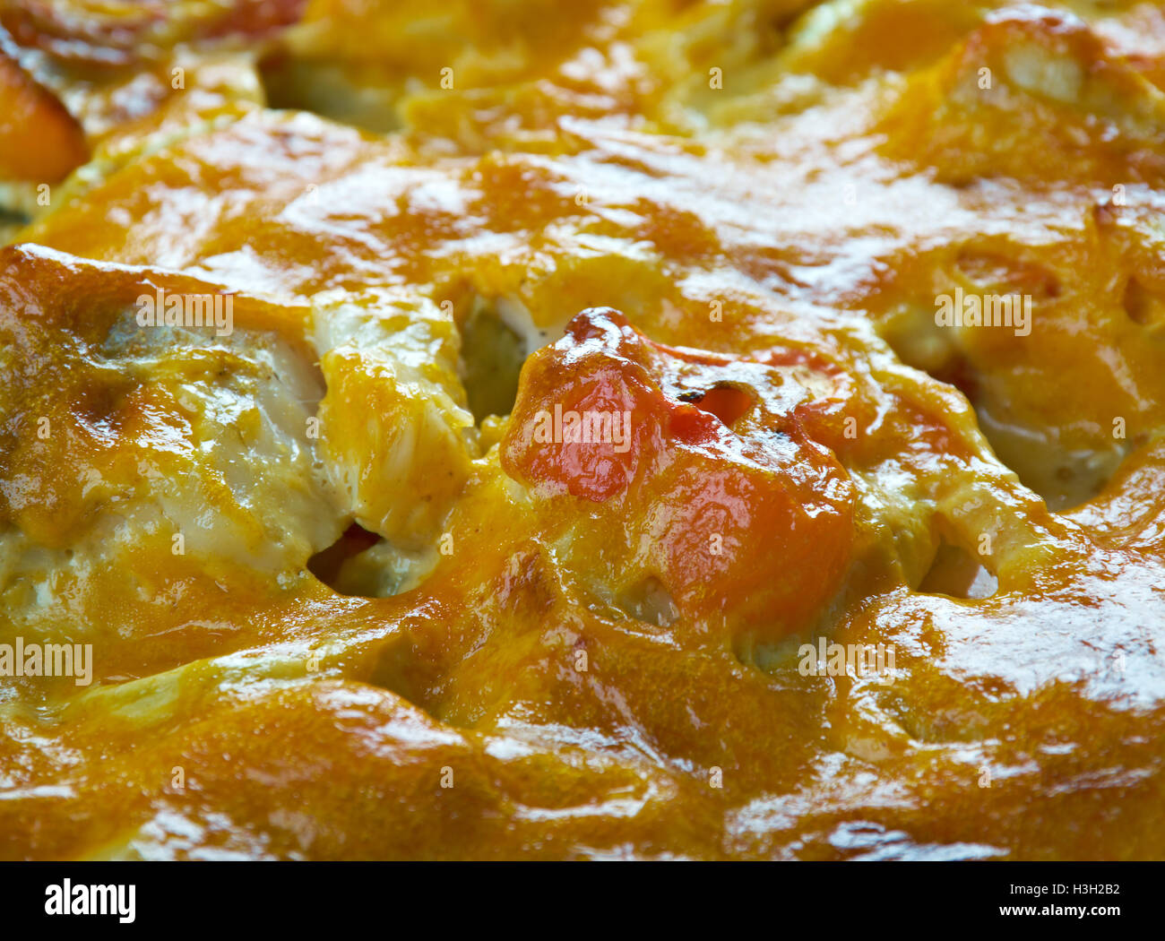 cod gratin with bearnaise sauce.French cuisine Stock Photo - Alamy