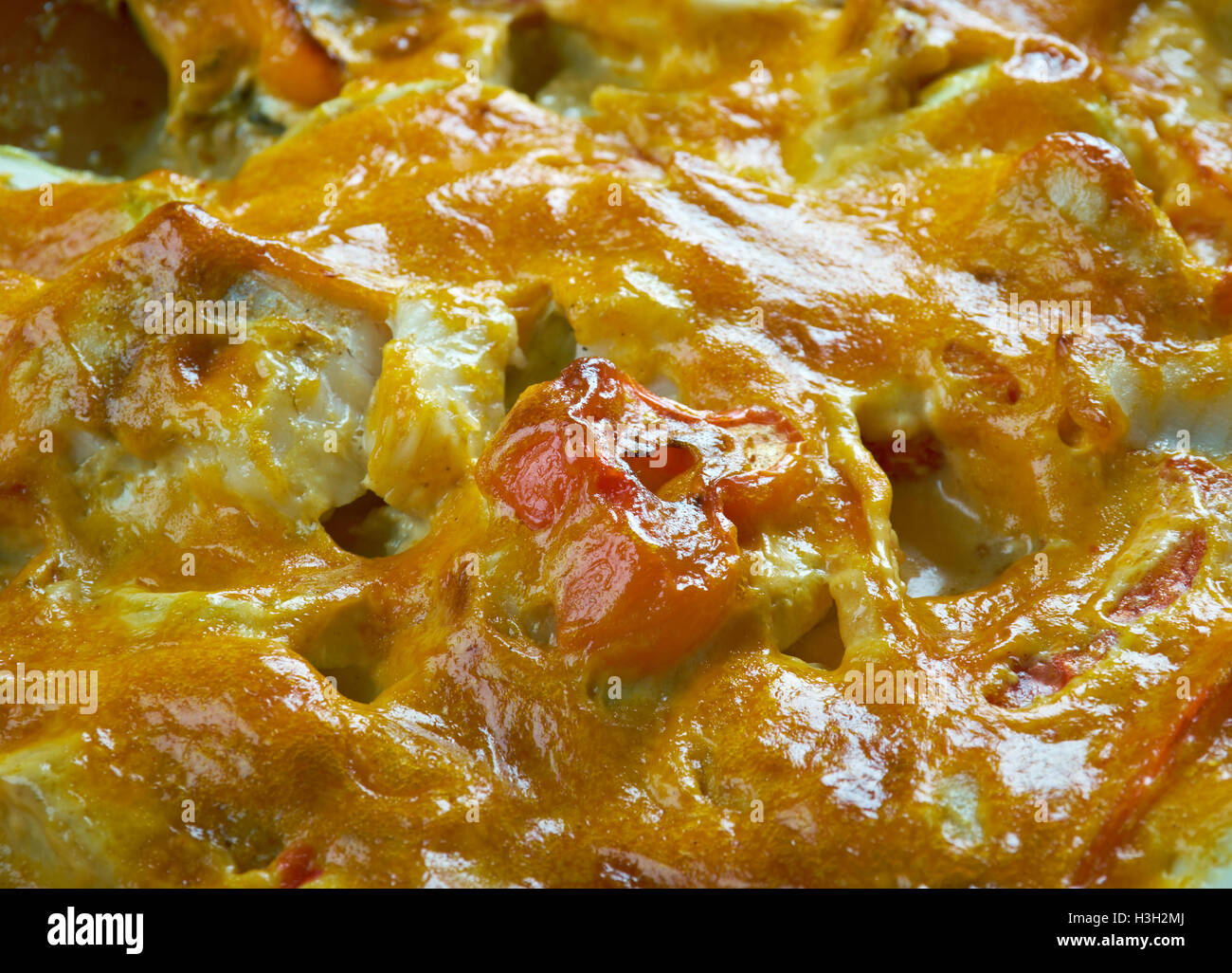 cod gratin with bearnaise sauce.French cuisine Stock Photo - Alamy