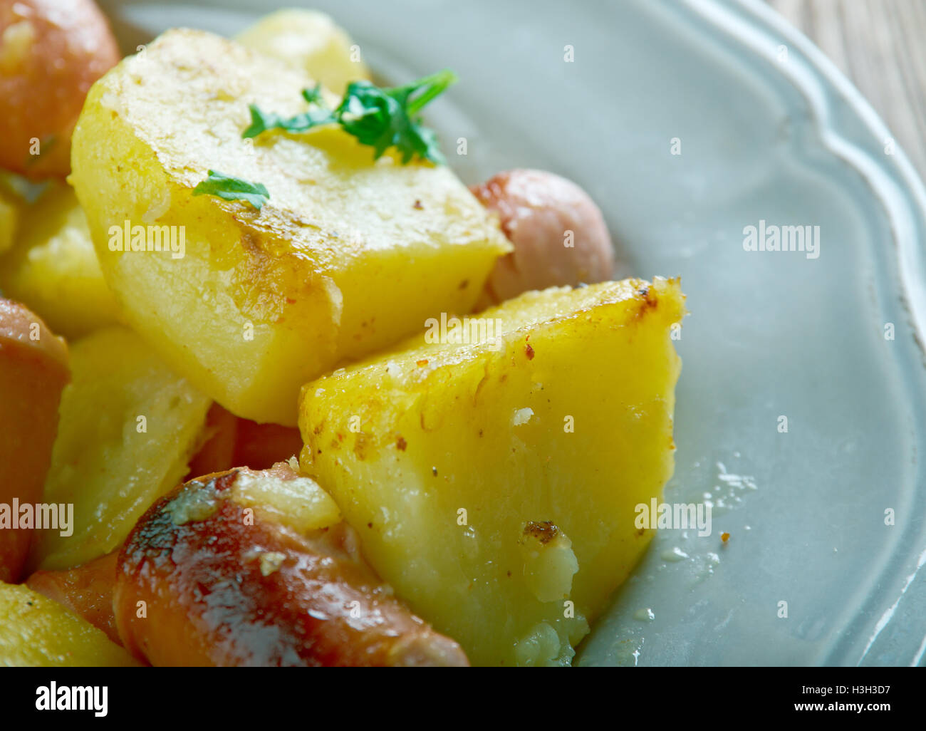 Finnish Fried potatoes with sausages- paistetut perunat Stock Photo - Alamy