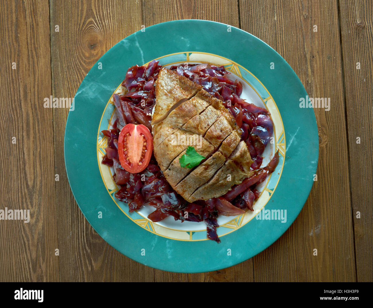 Pot Roast Of Pork And Red Cabbage Stock Photo - Alamy