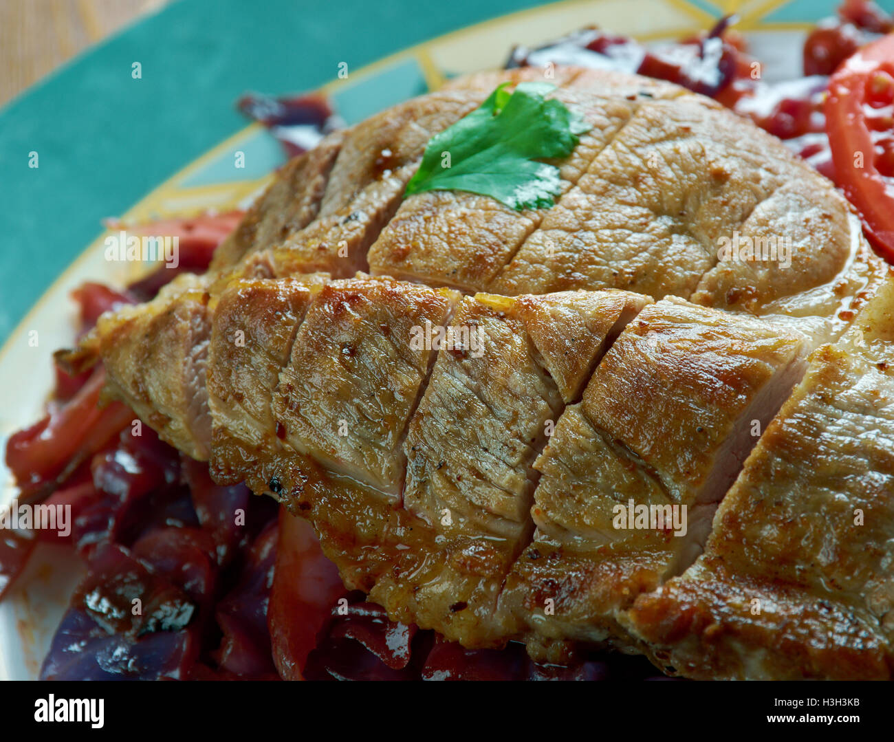 Pot Roast Of Pork And Red Cabbage Stock Photo - Alamy