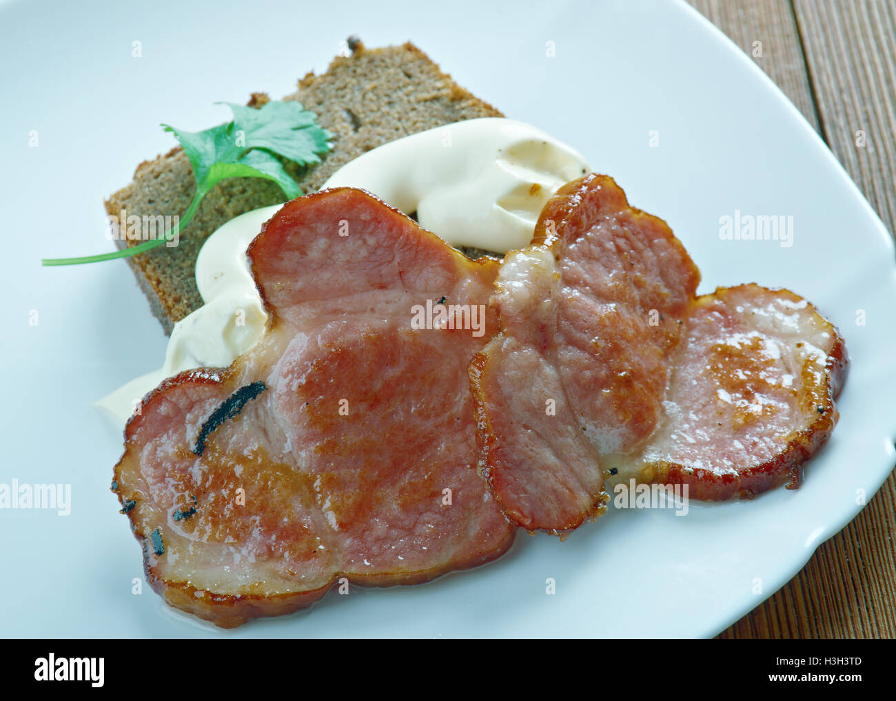 Paltbrod Swedish speciality bread with bacon & white sauce Stock Photo ...