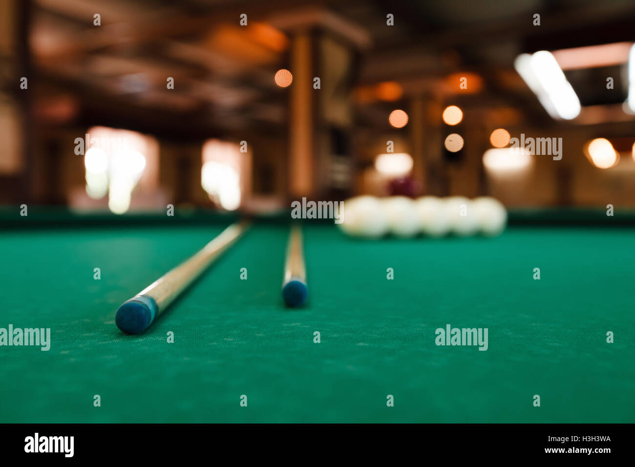 Billiard balls and pool sticks Stock Photo - Alamy