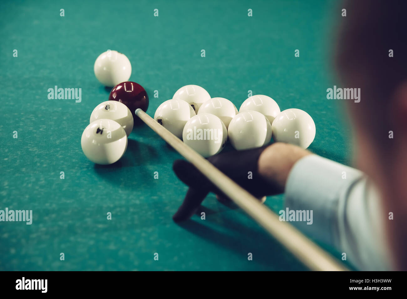 Man playing billiard Stock Photo - Alamy