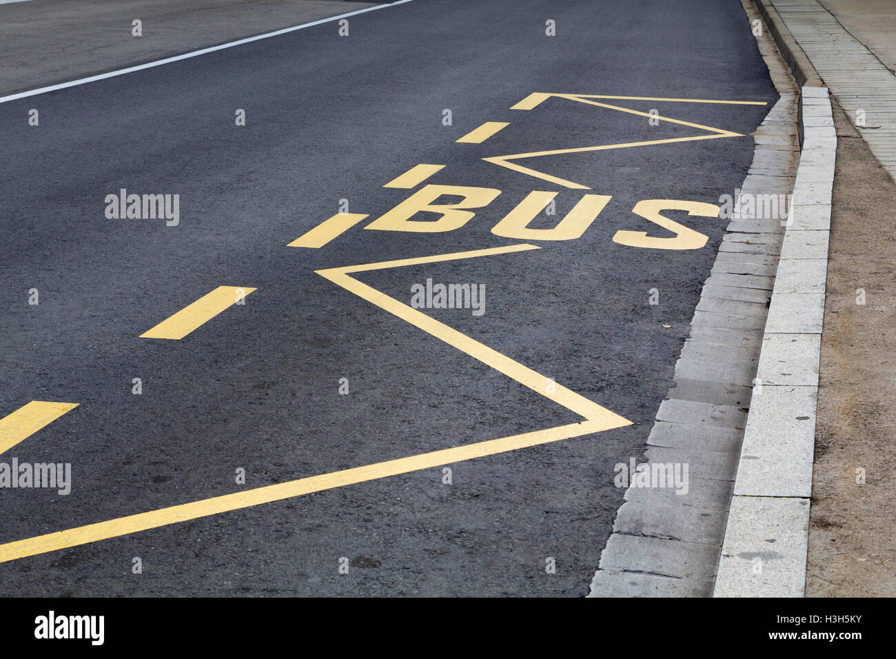 Parking zone for bus, in a public road Stock Photo - Alamy