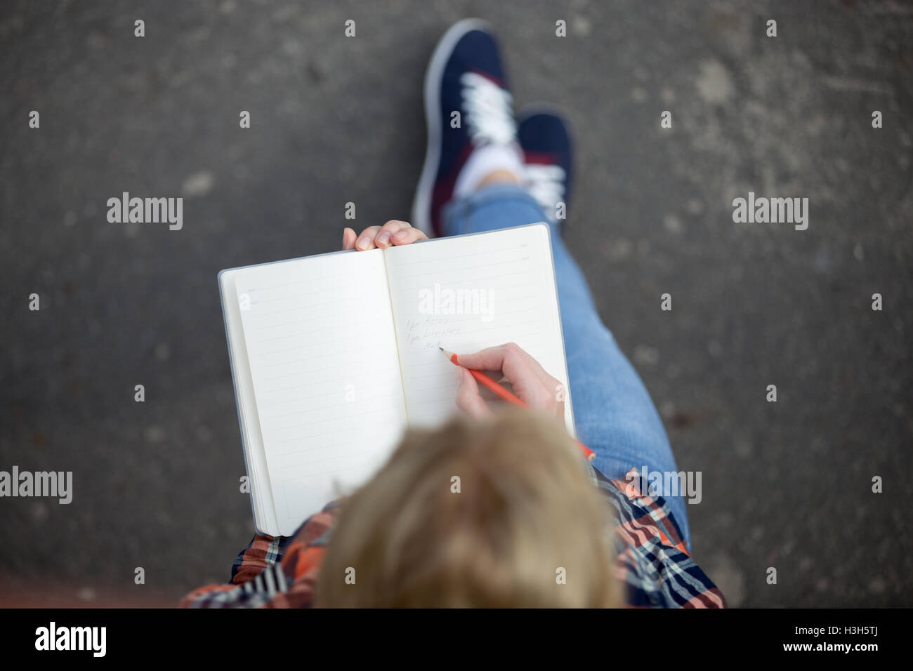 Adult notebook writing hi-res stock photography and images - Alamy