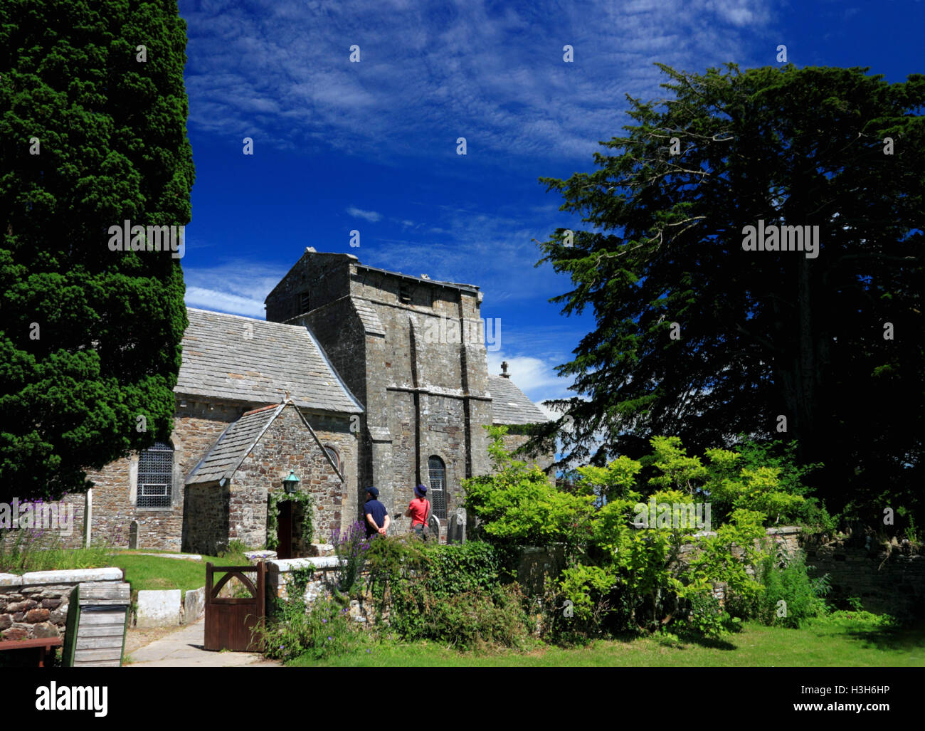 The ancient church of St Nicholas, Studland, framed by trees Stock ...