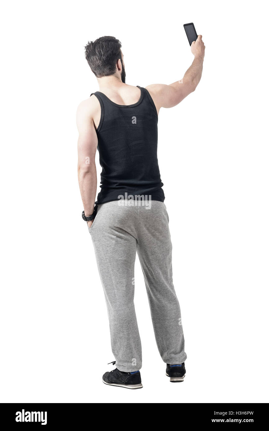 Back view of man taking picture with smartphone Cut Out Stock Images ...