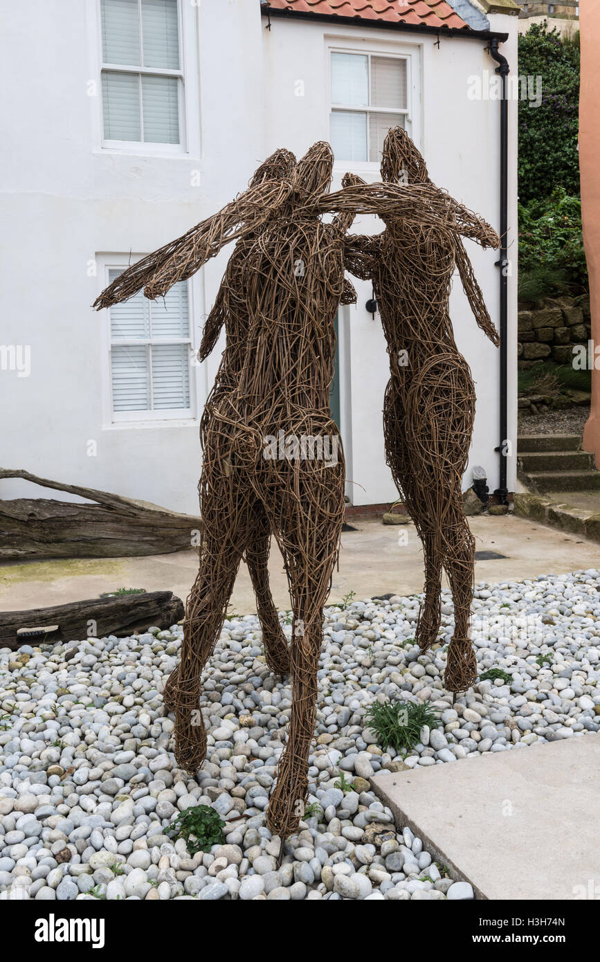 A sculpture of three wicker hares at Staithes in North Yorkshire Stock ...