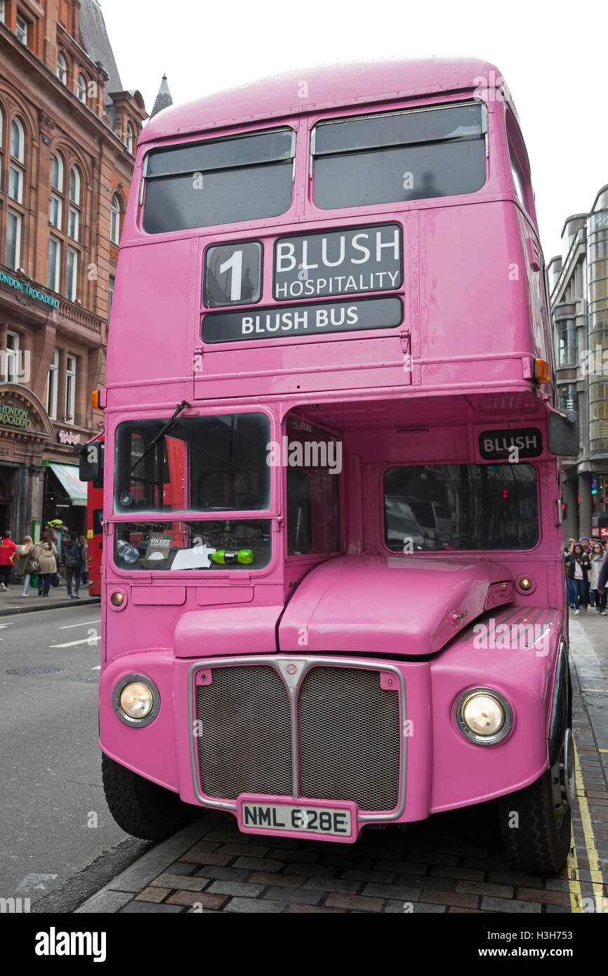 Pink double decker Blush bus in Central London Stock Photo - Alamy