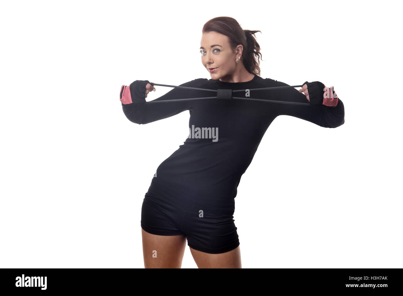 fitness woman using rubber band resistance training Stock Photo - Alamy