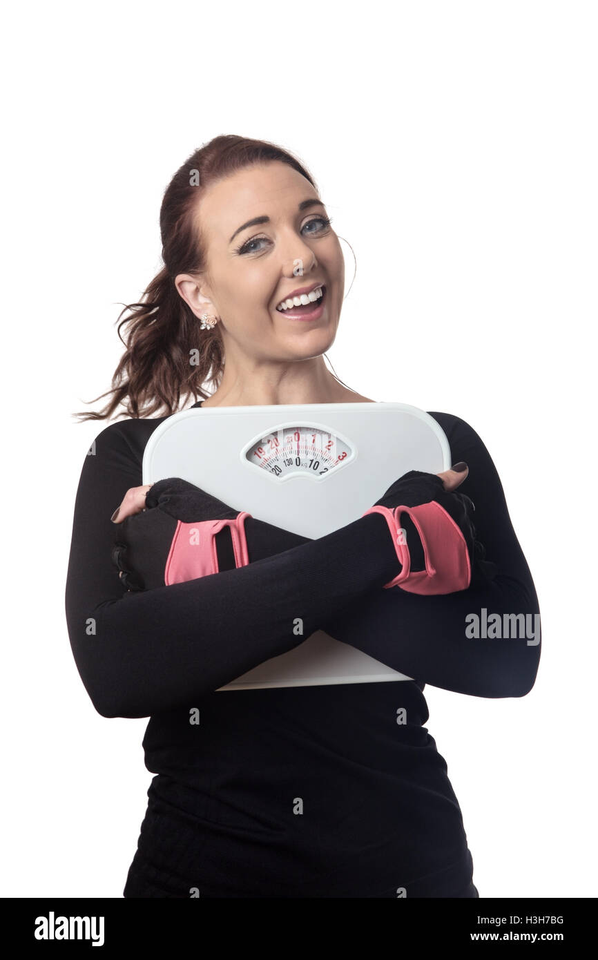 Woman holding scales hi-res stock photography and images - Alamy