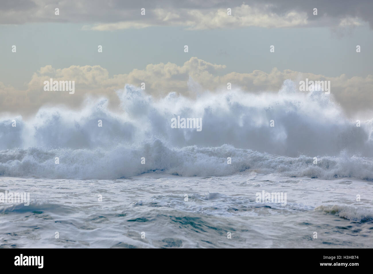 Ocean waves crashing exploding water power from weather storms Stock ...
