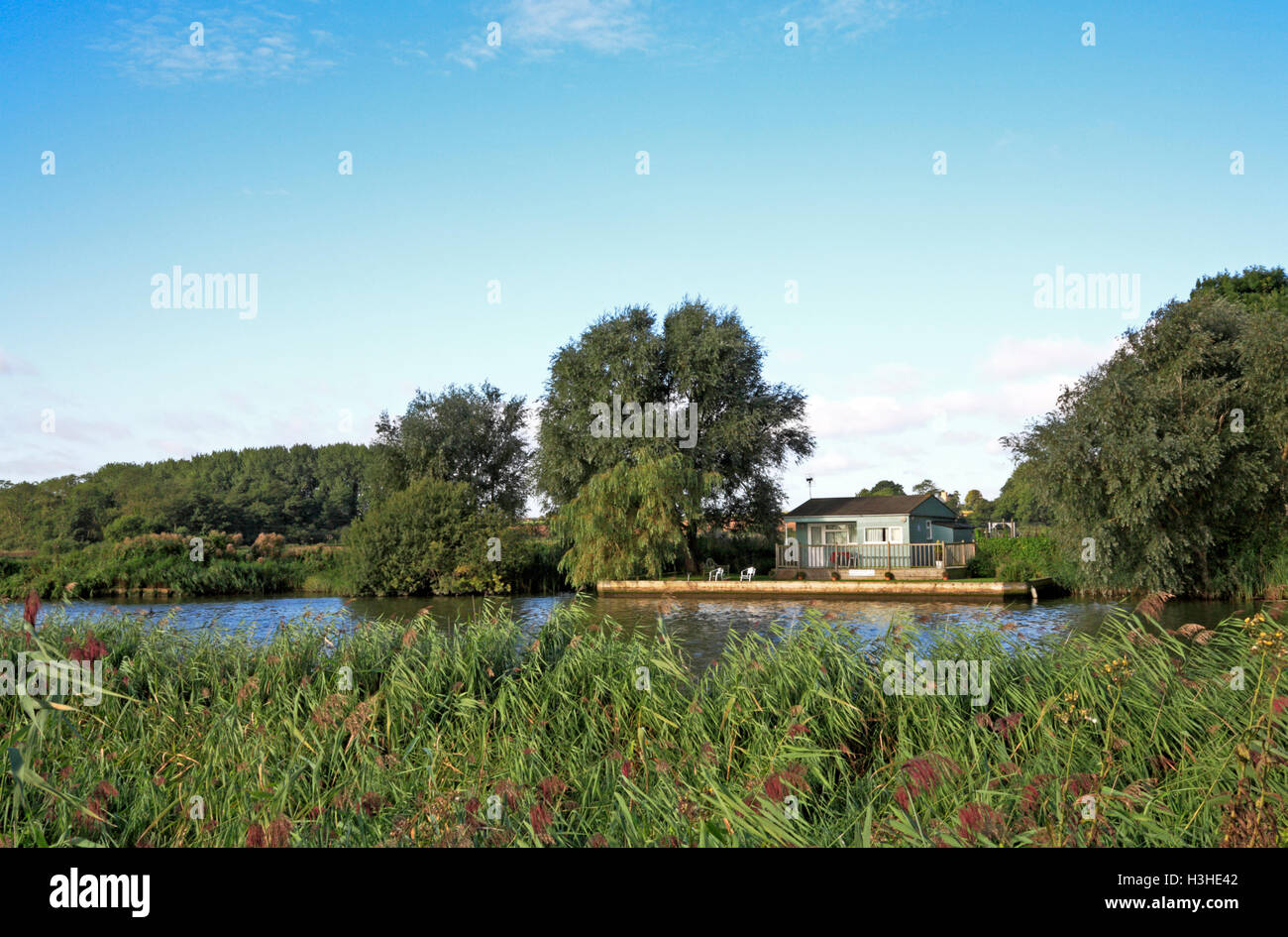 A riverside plot and mooring by the River Bure on the Norfolk Broads ...