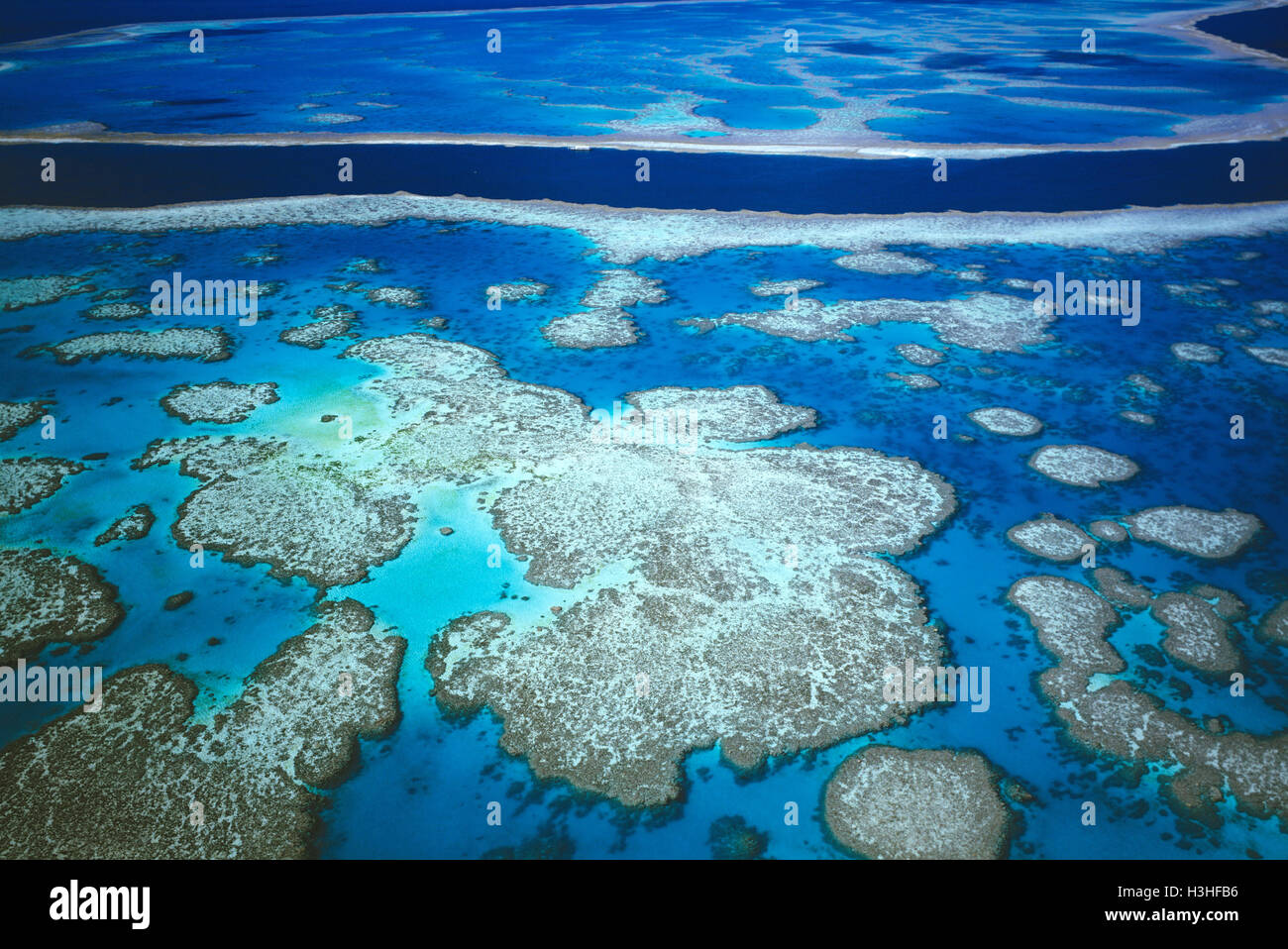 Hardy Reef, separated from Hook Reef by deep tidal channel Stock Photo ...