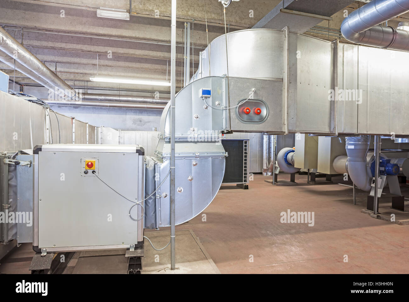 under the roof of a large building, there is a technical room with ...