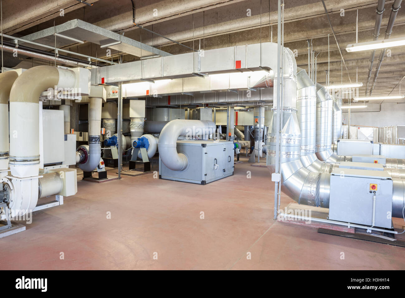 under the roof of a large building, there is a technical room with ...