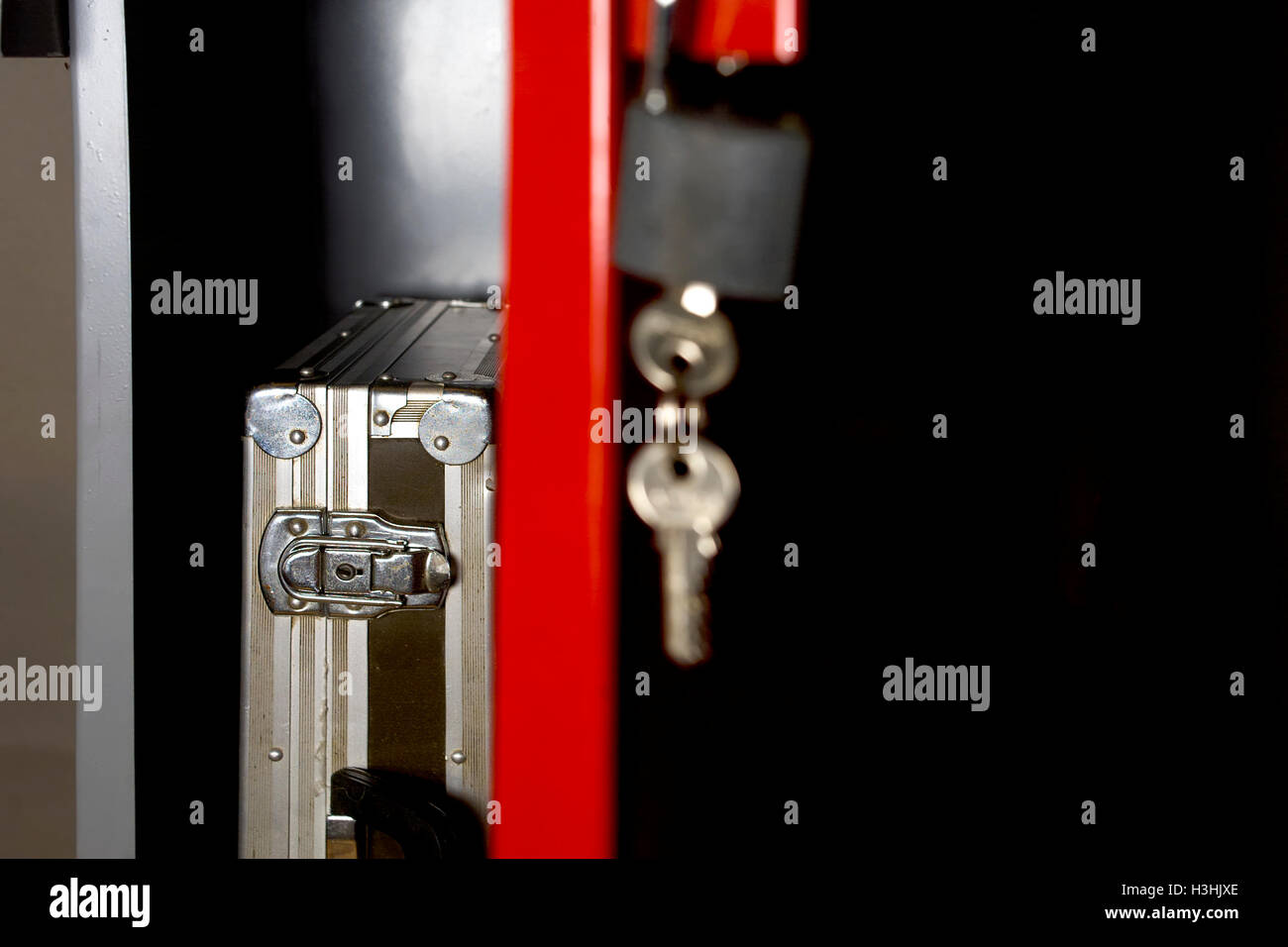 Briefcase In A Safe Stock Photo - Alamy