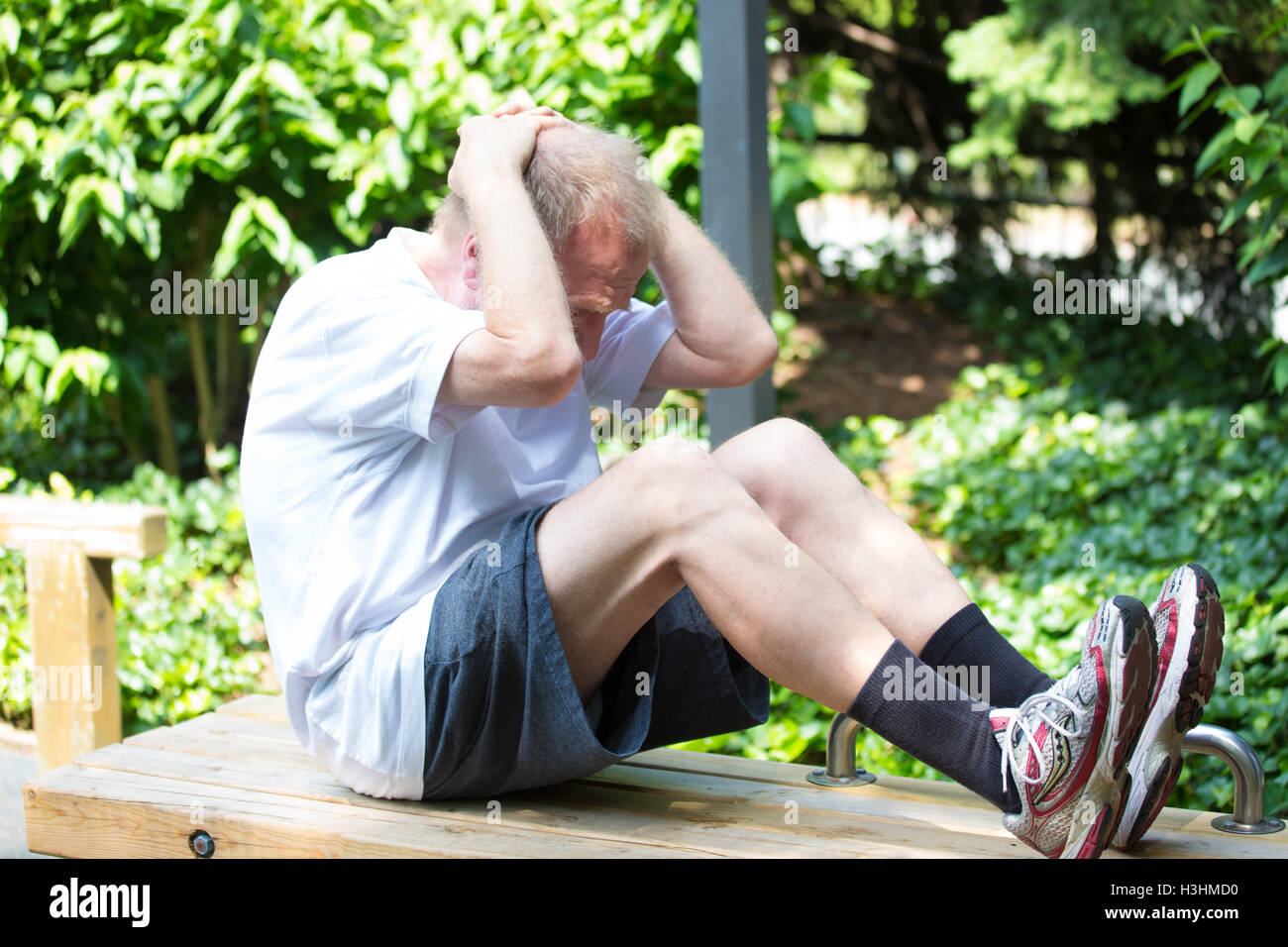 Man Doing Sit Ups Stock Photos & Man Doing Sit Ups Stock Images - Alamy