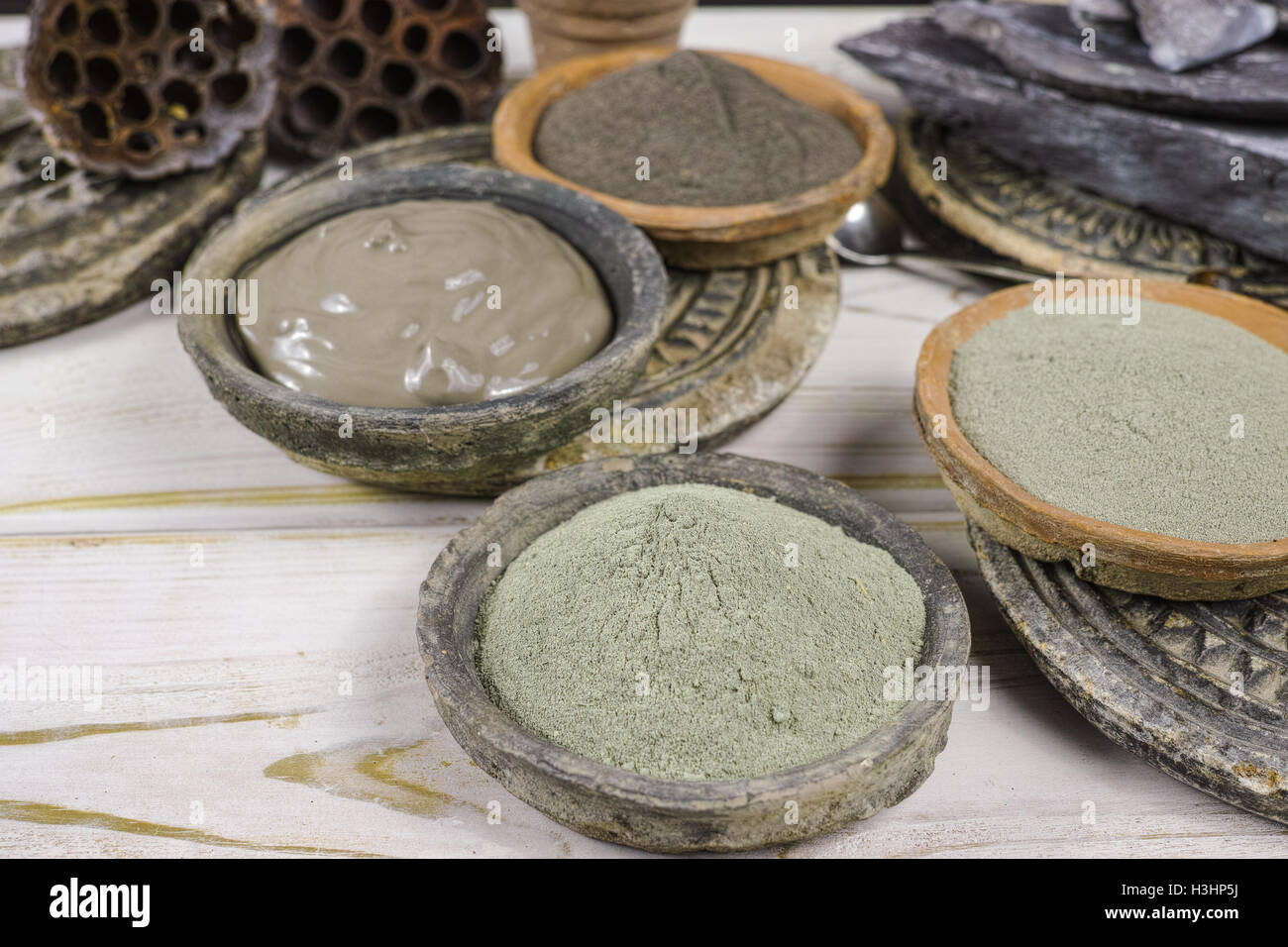 Ancient minerals - black, green, blue clay powder and mud mask for spa ...