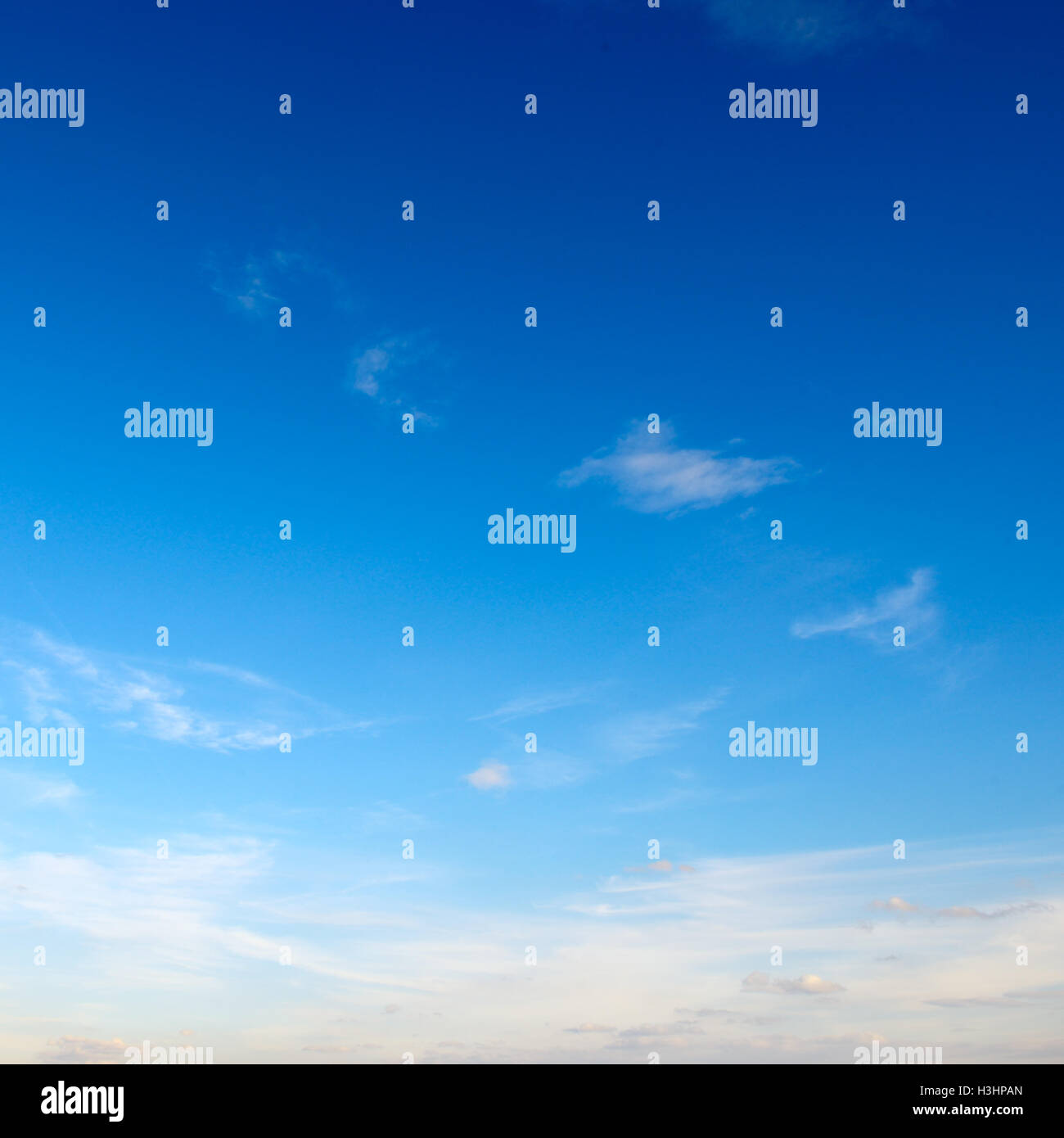 light clouds in the blue sky Stock Photo - Alamy