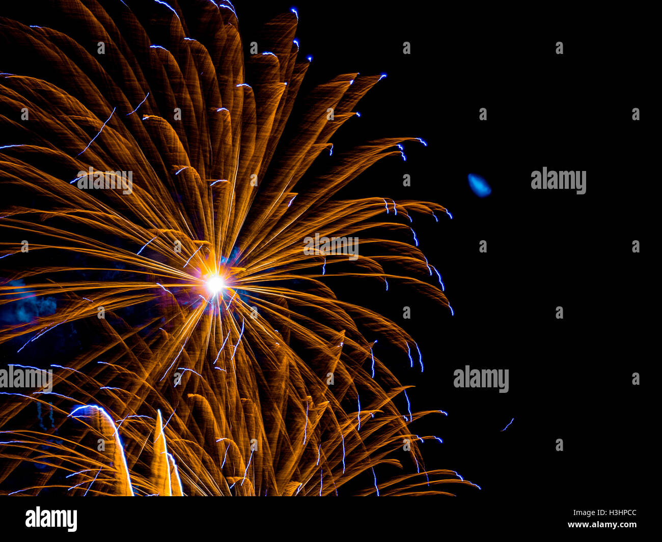 Gold and blue large burst.Spectacular fireworks Stock Photo - Alamy